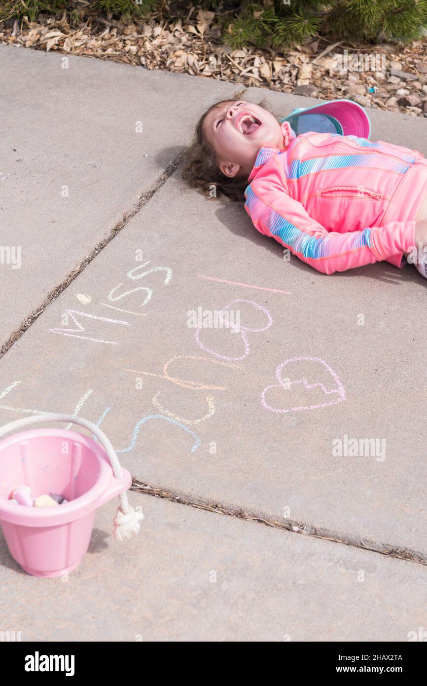 I miss school chalk sign in driveway Stock Photo - Alamy
