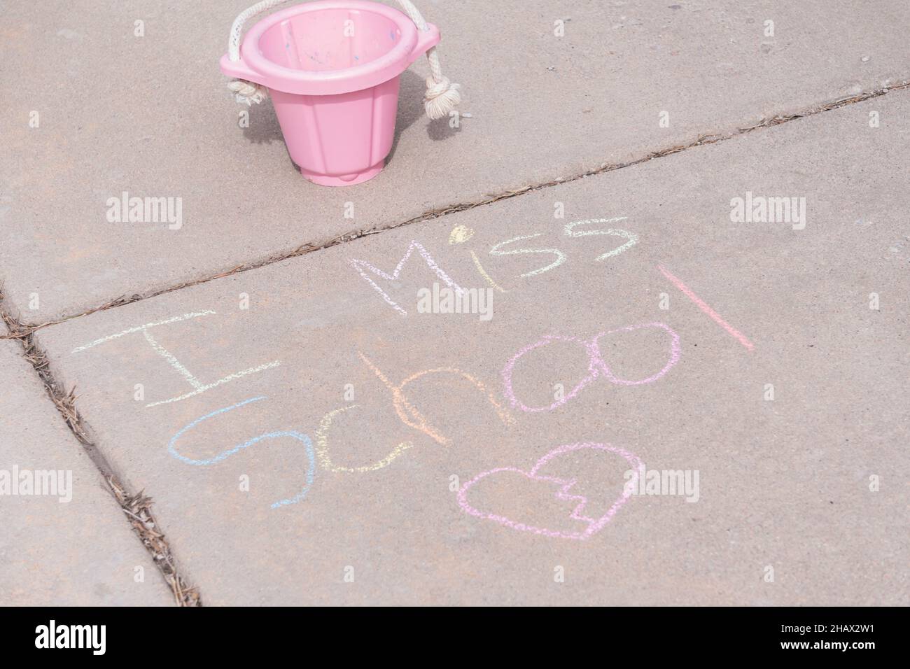 I miss school chalk sign in driveway Stock Photo - Alamy