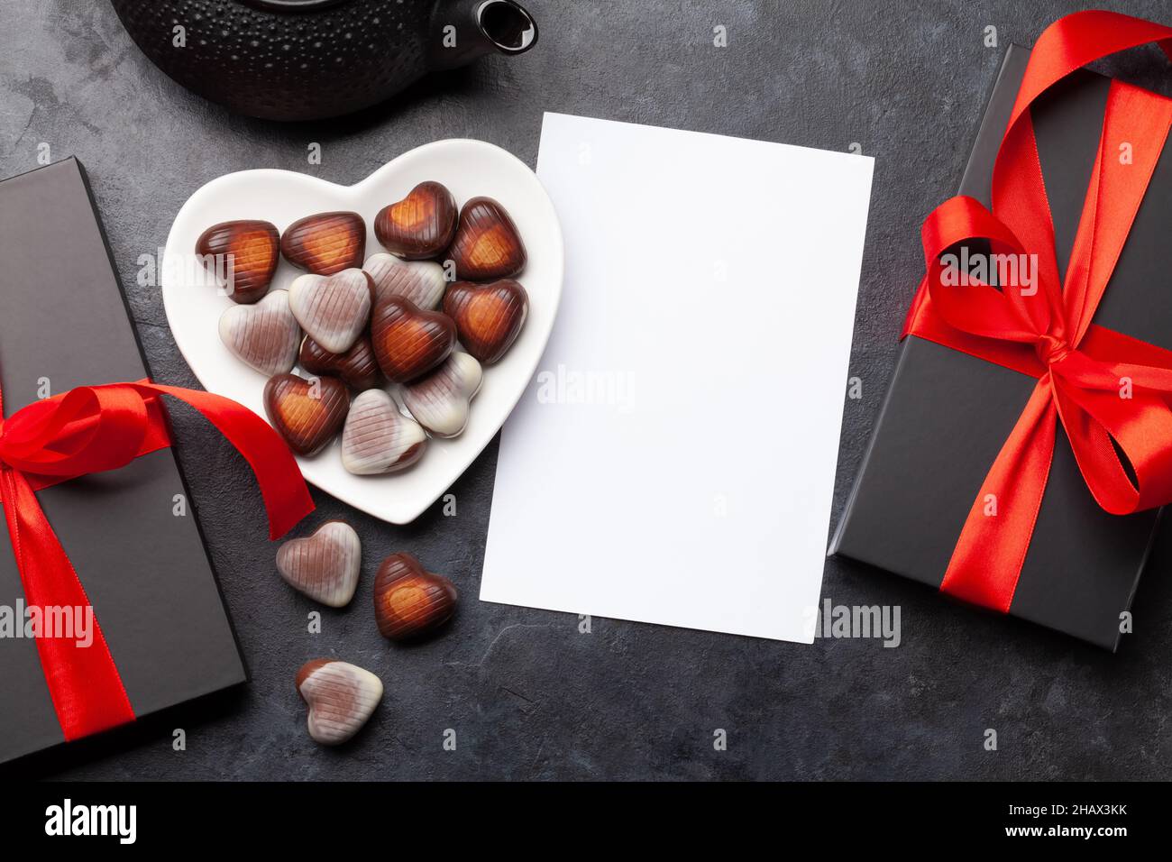 Valentines day heart shaped chocolate sweets and gift boxes. Top view ...