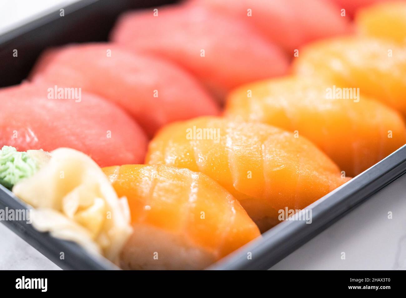 Pre-packaged sushi in a plastic tray Stock Photo - Alamy