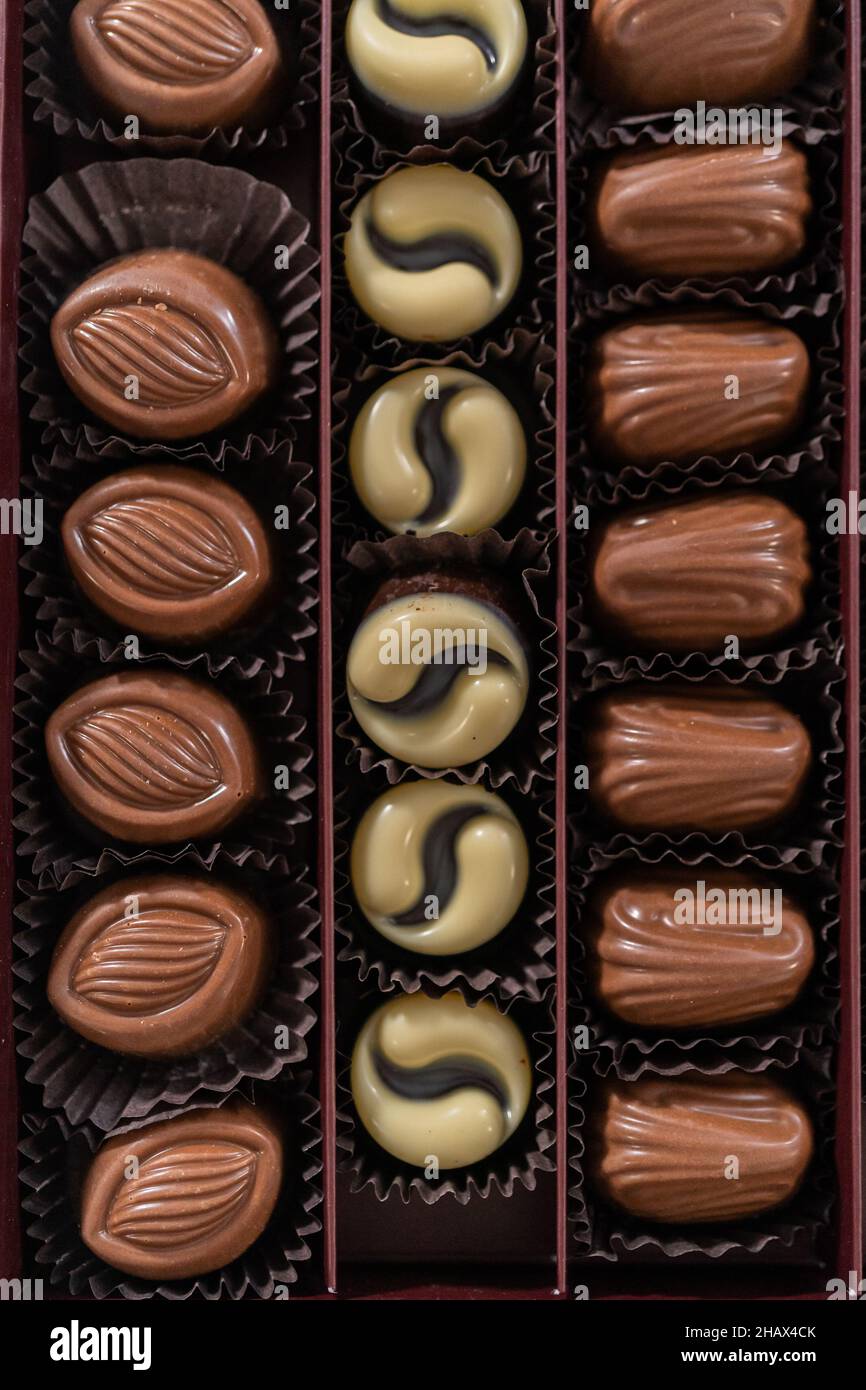 Box of gourmet assorted chocolates ina large box Stock Photo - Alamy