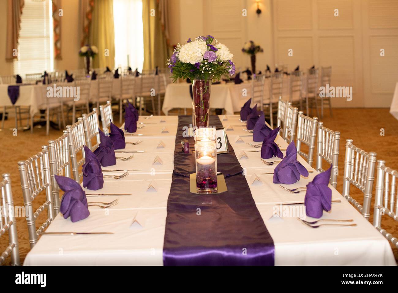 Purple theme wedding ceremony table setting Stock Photo - Alamy