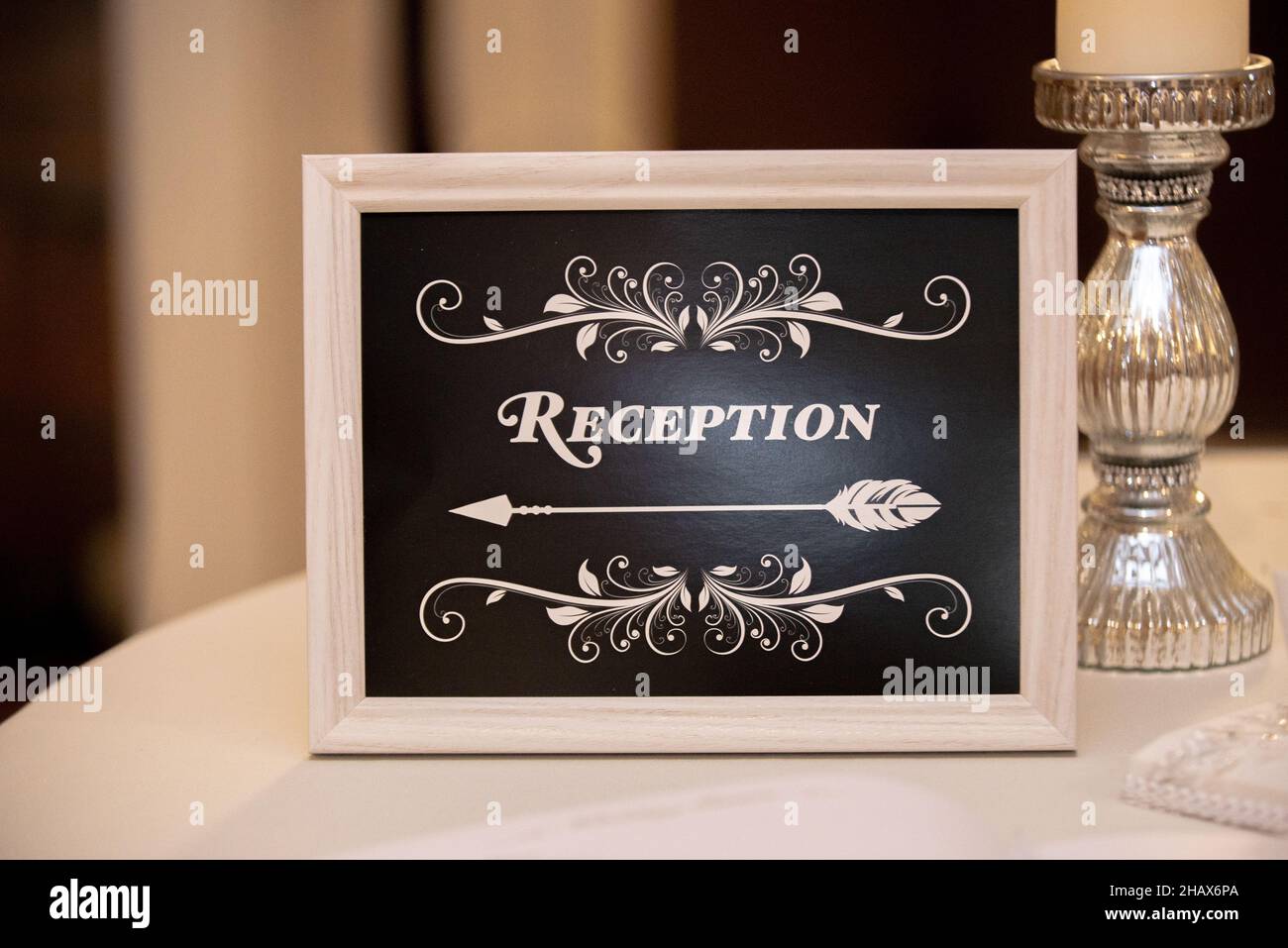 Wedding ceremony directional sign that reads "reception Stock Photo - Alamy