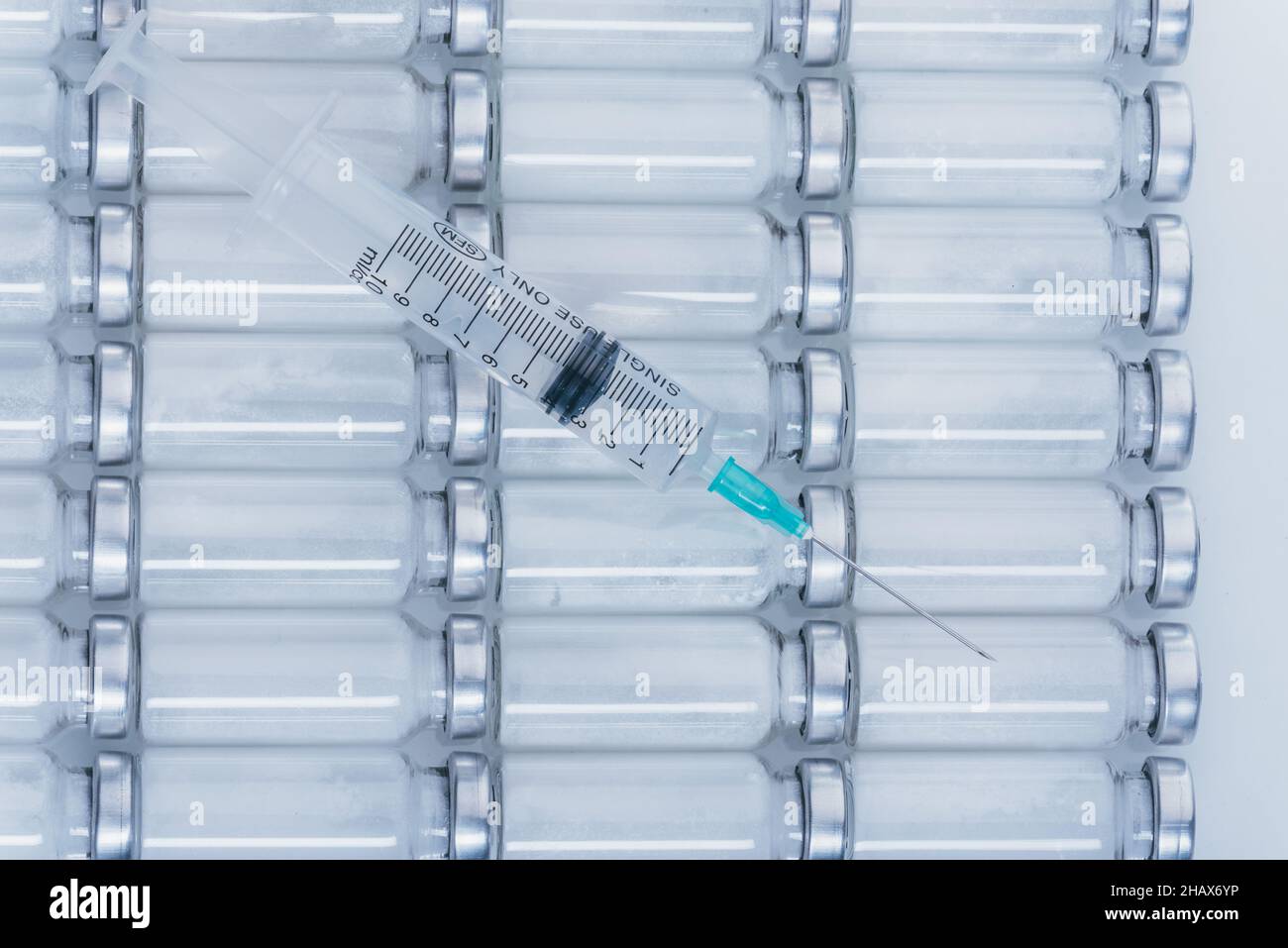 Medicine, Injection, vaccine and disposable syringe, drug concept ...
