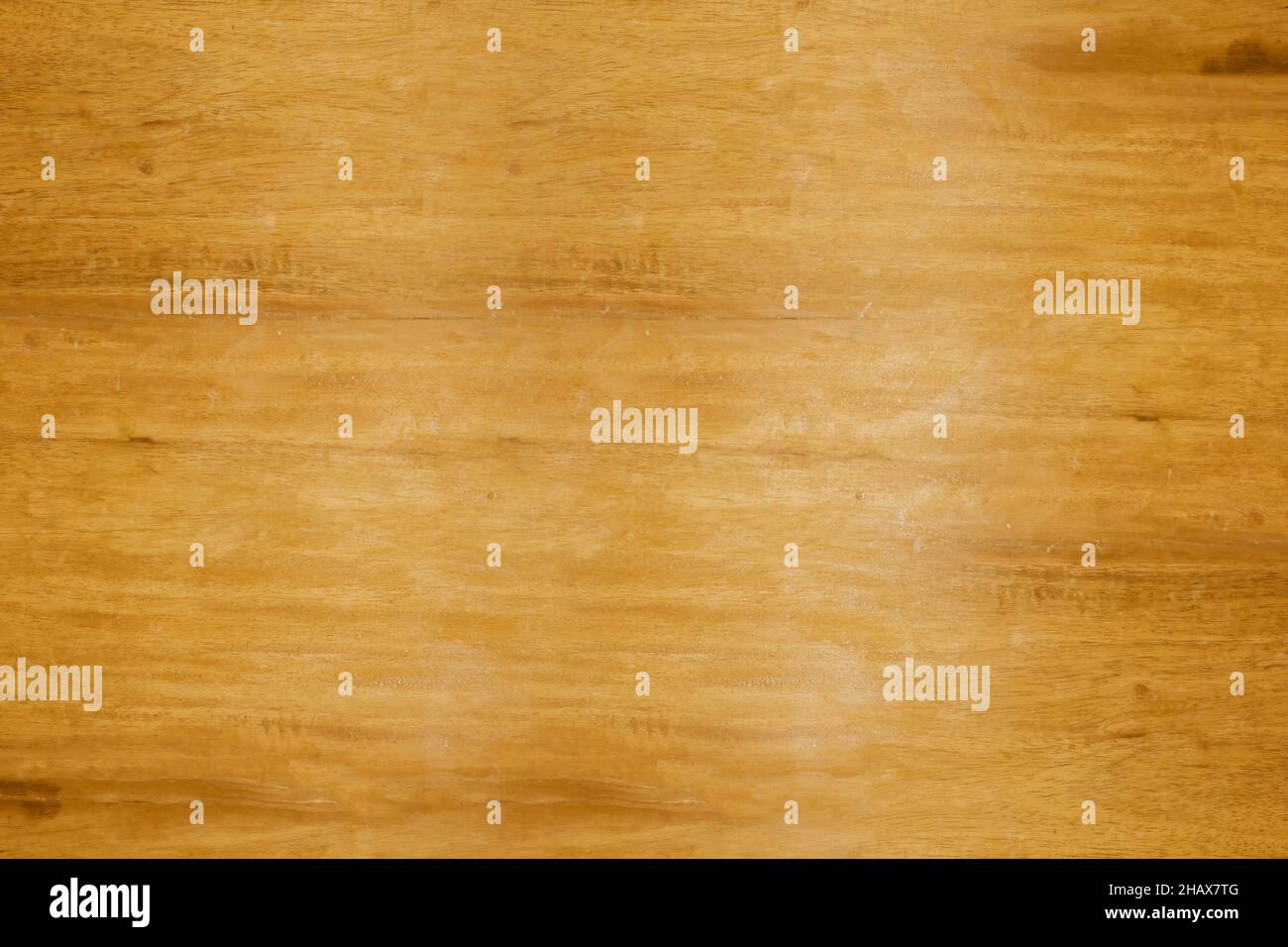 Smooth textured yellow wooden board close up top view for background ...