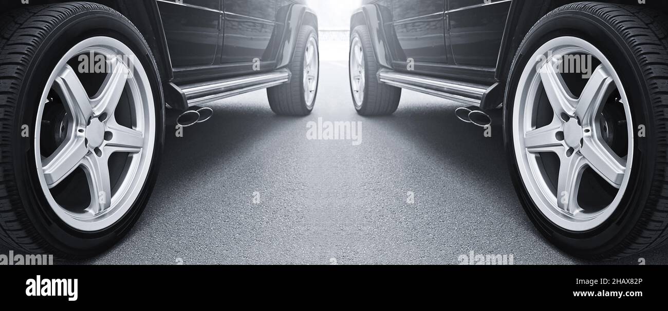 Car wheels close up on a background of asphalt. Car tires. Car wheel ...
