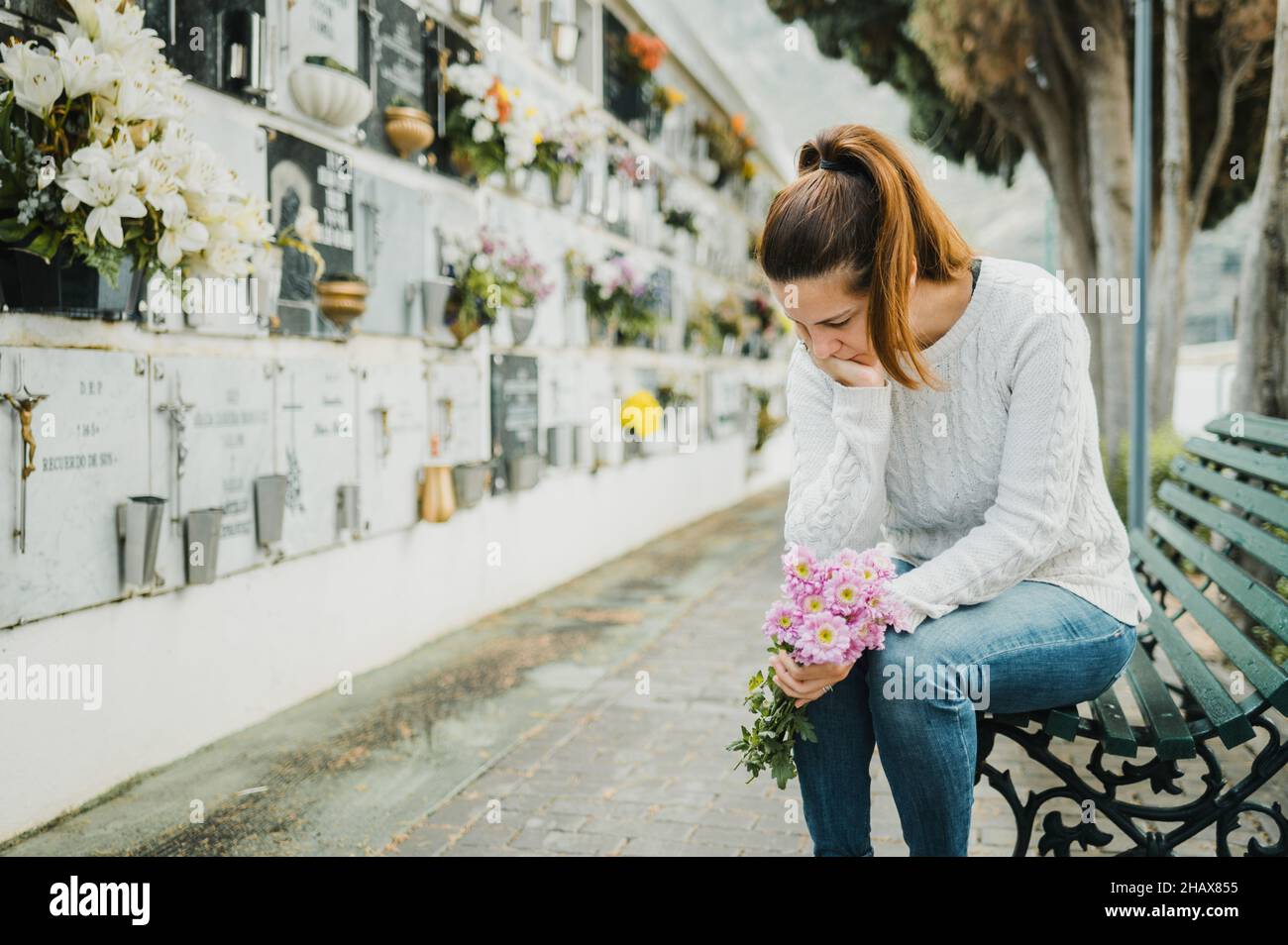 People Crying At A Grave