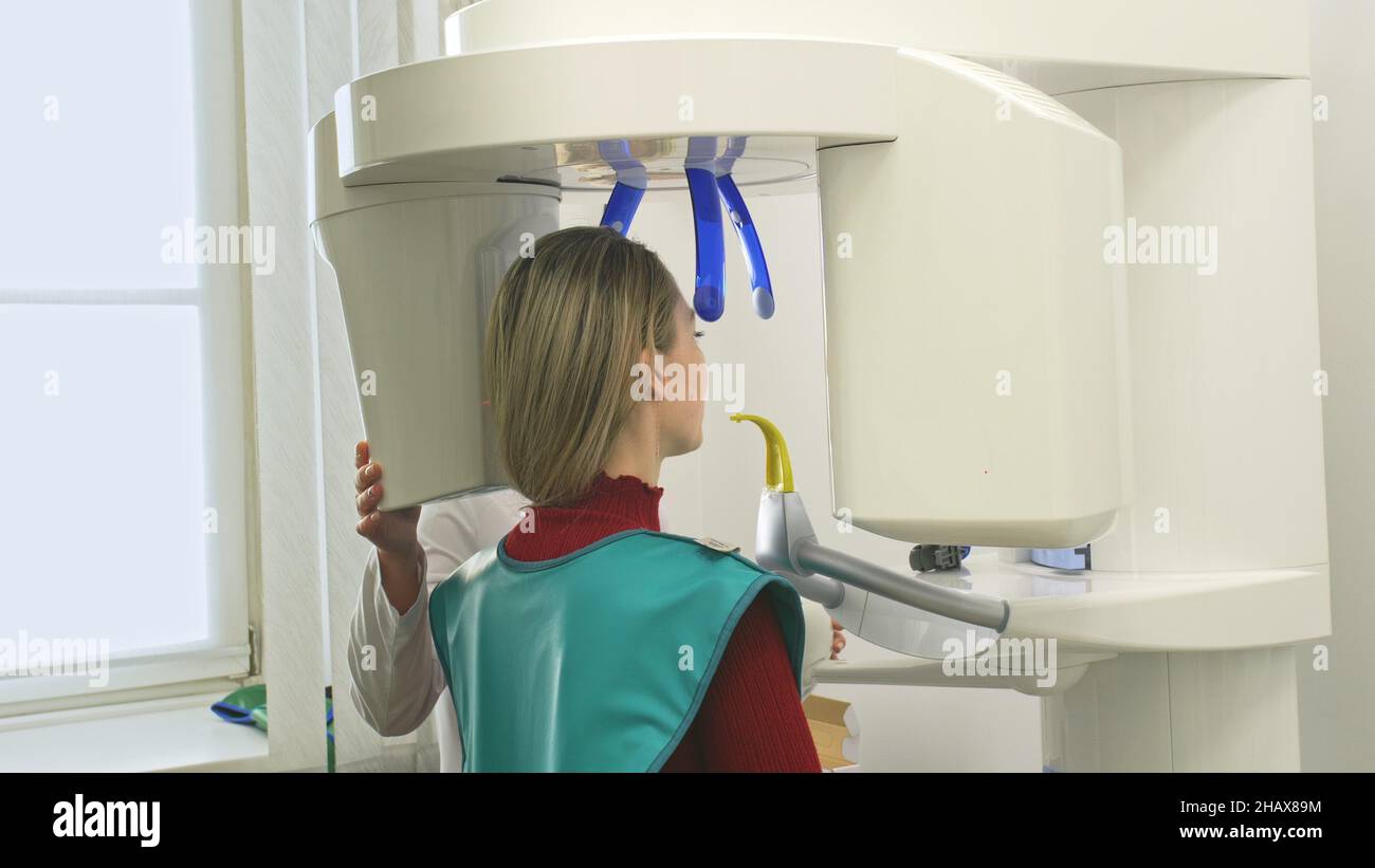 Doctor to take a image 3d scanner tomography of teeth and jaw in modern ...