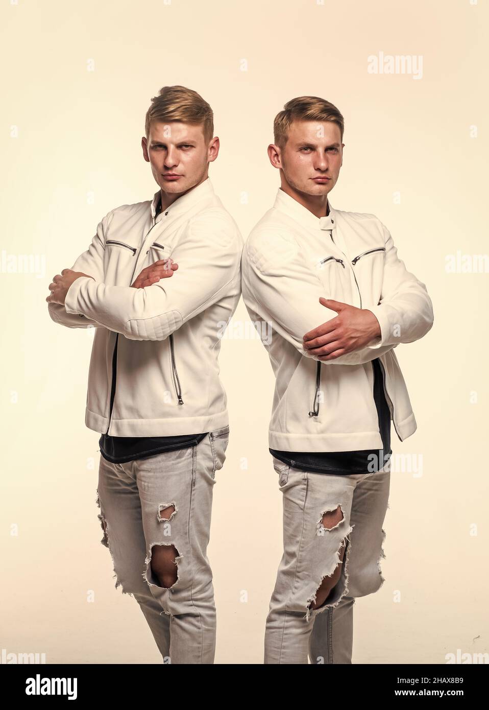 twin brothers men in white casual clothes look alike, male fashion ...