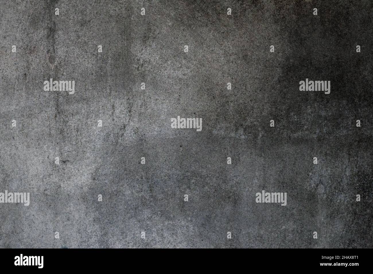 Dark sandy plaster wall surface with grunge texture for background ...