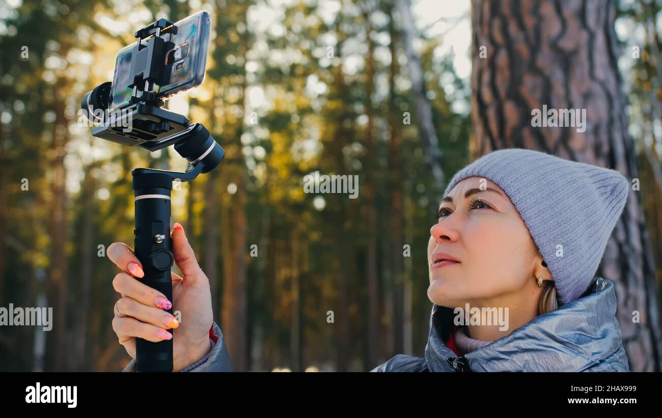 Woman Holding On Handheld Film 3-axis Gimbal Stabilization Devic Stock ...