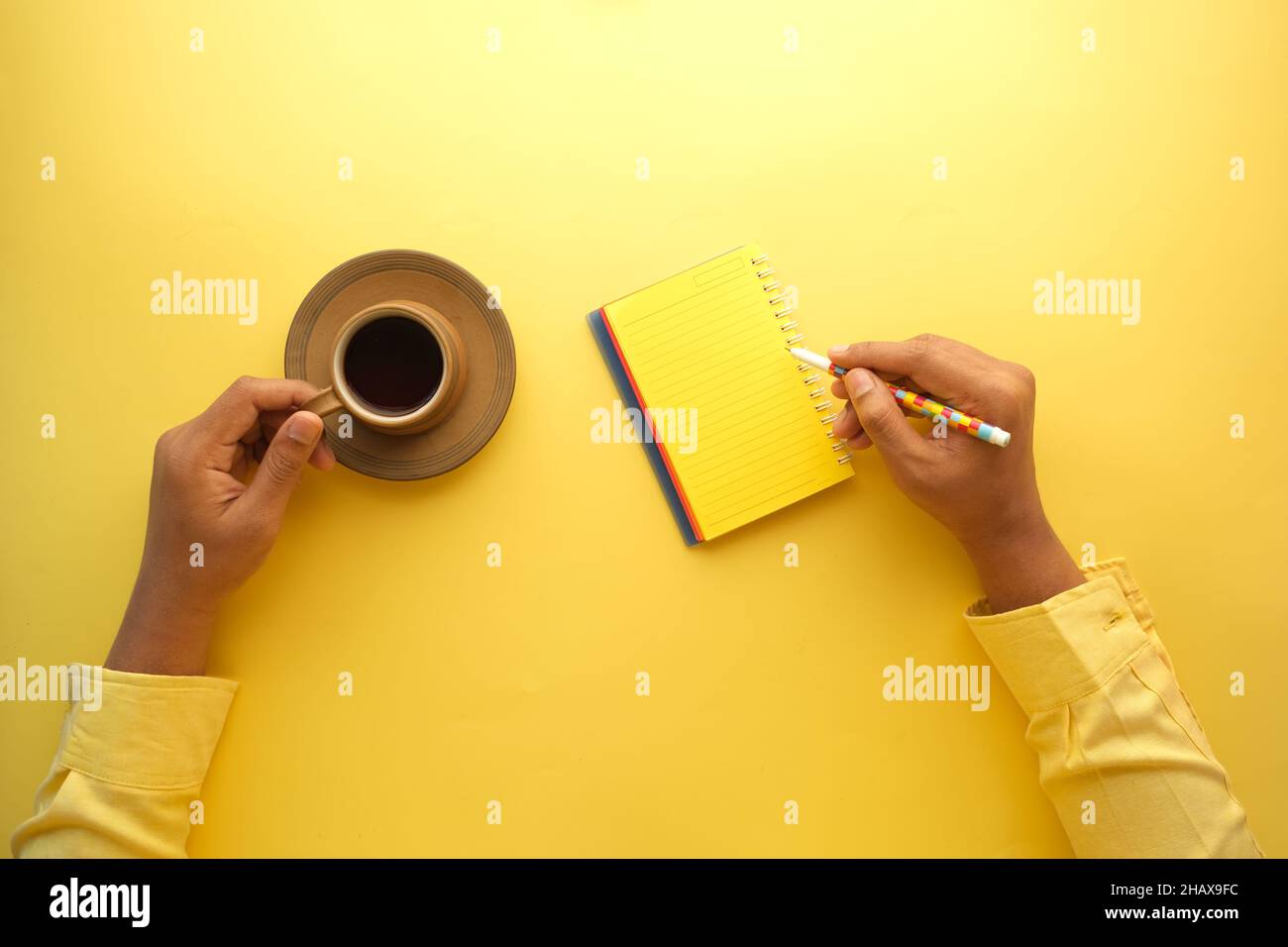 One man writing hand pen notepad hi-res stock photography and images ...