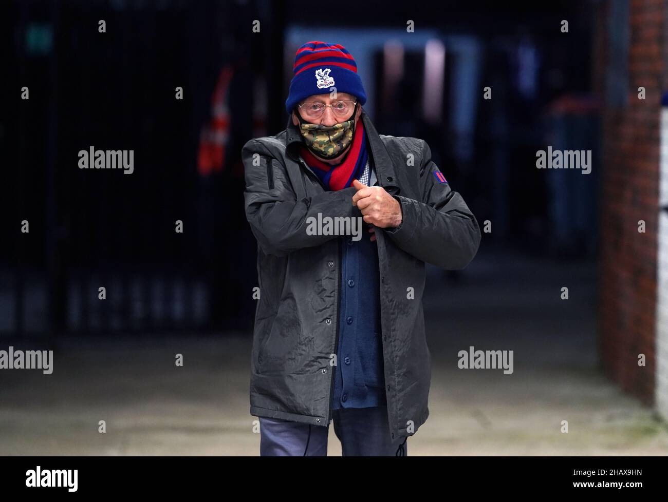 Fans arrive wearing face masks ahead of the Premier League match at ...