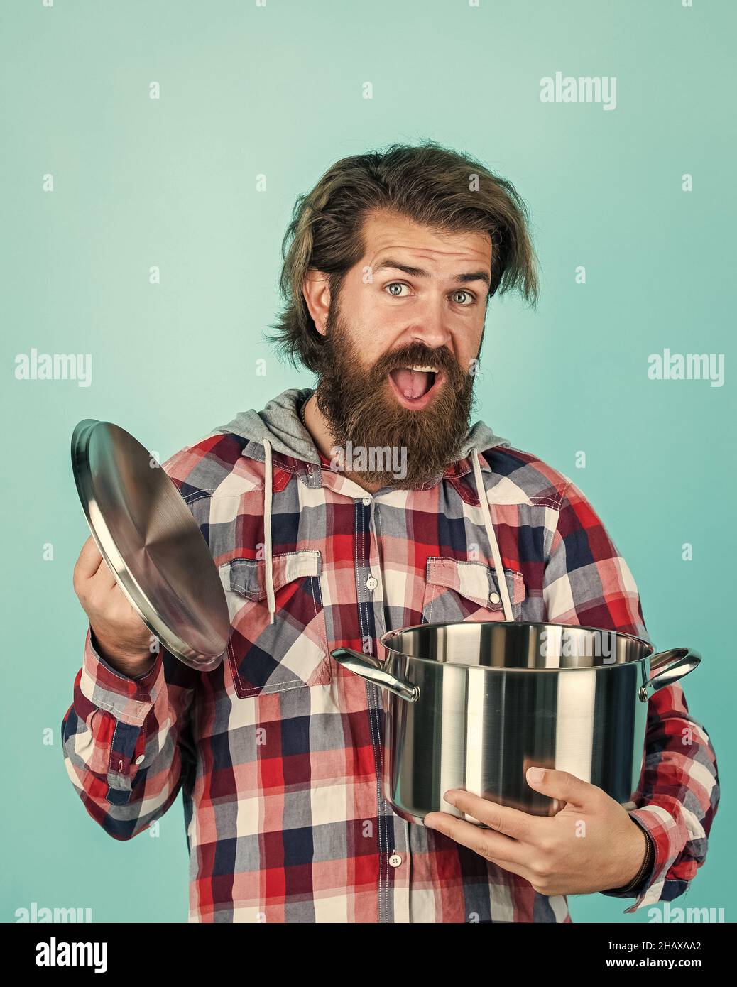 wow. man holding frying pan.. male chef kitchener cooking. hipster ...