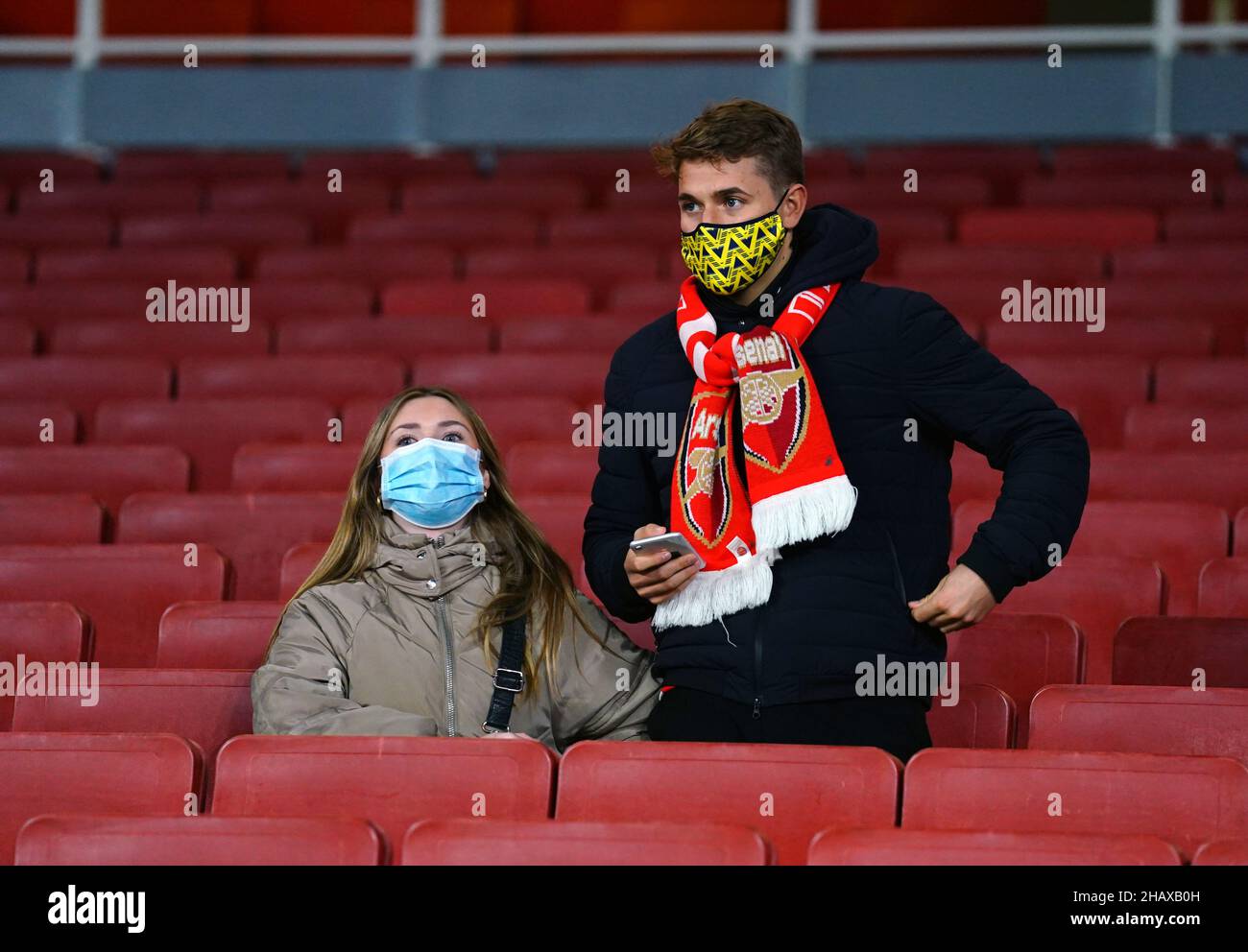 Fans wearing face masks as they take their seats ahead of the Premier ...