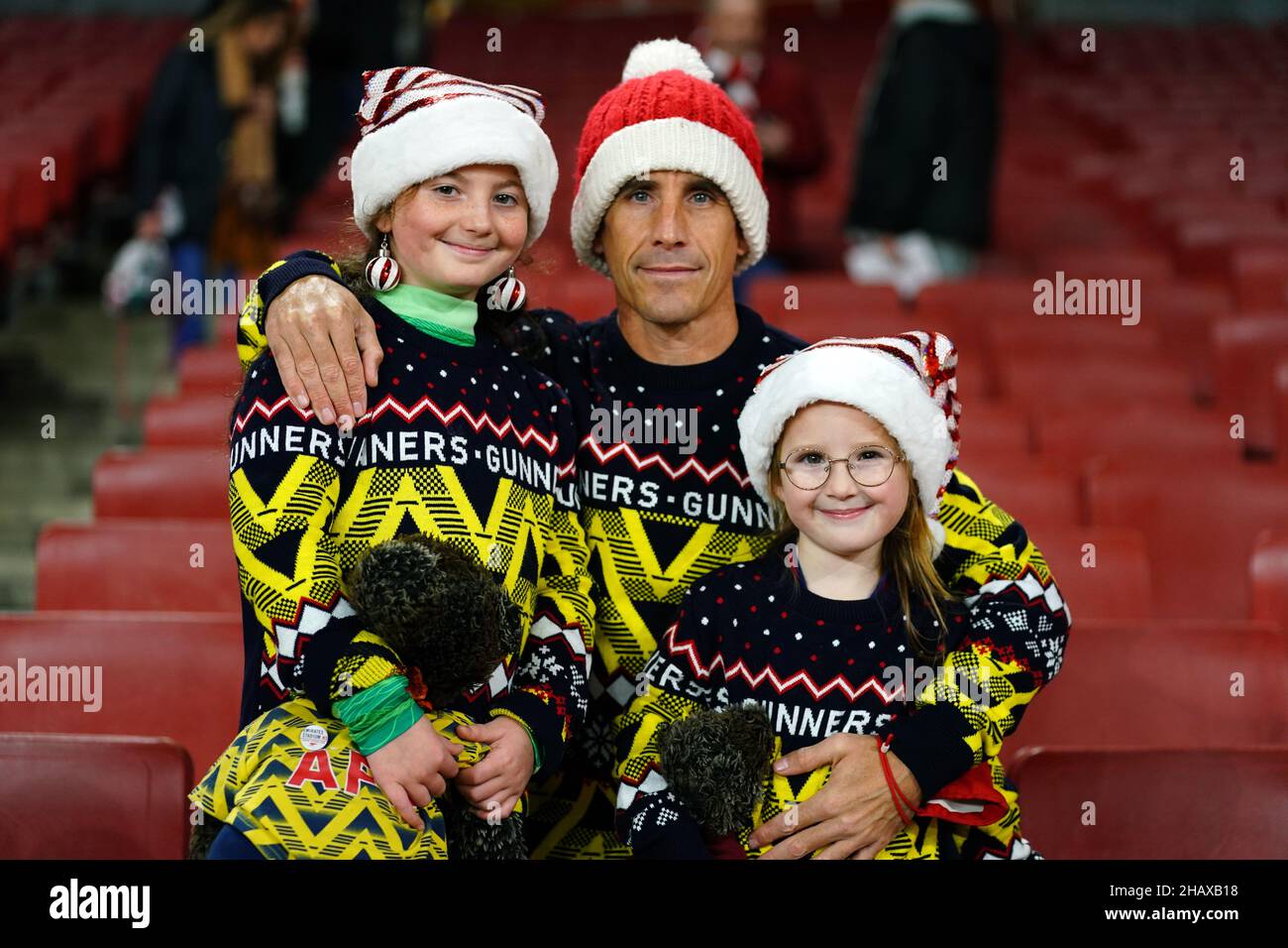 Arsenal fans sporting Christmas jumpers ahead of the Premier League ...