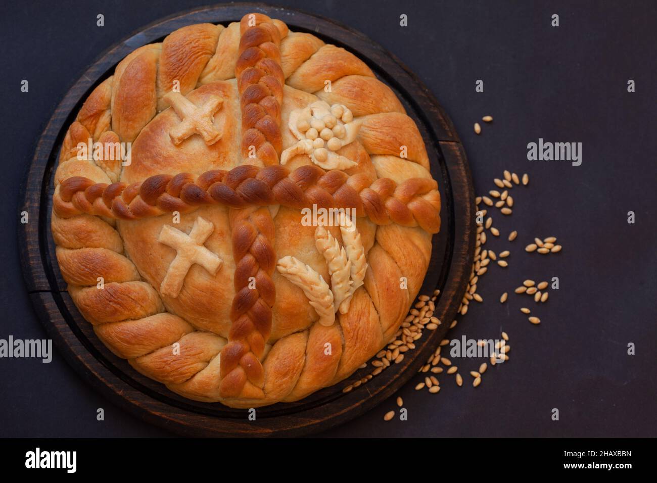 Serbian slava cake with a cross, top view. Slavski kolač. Decorative ...