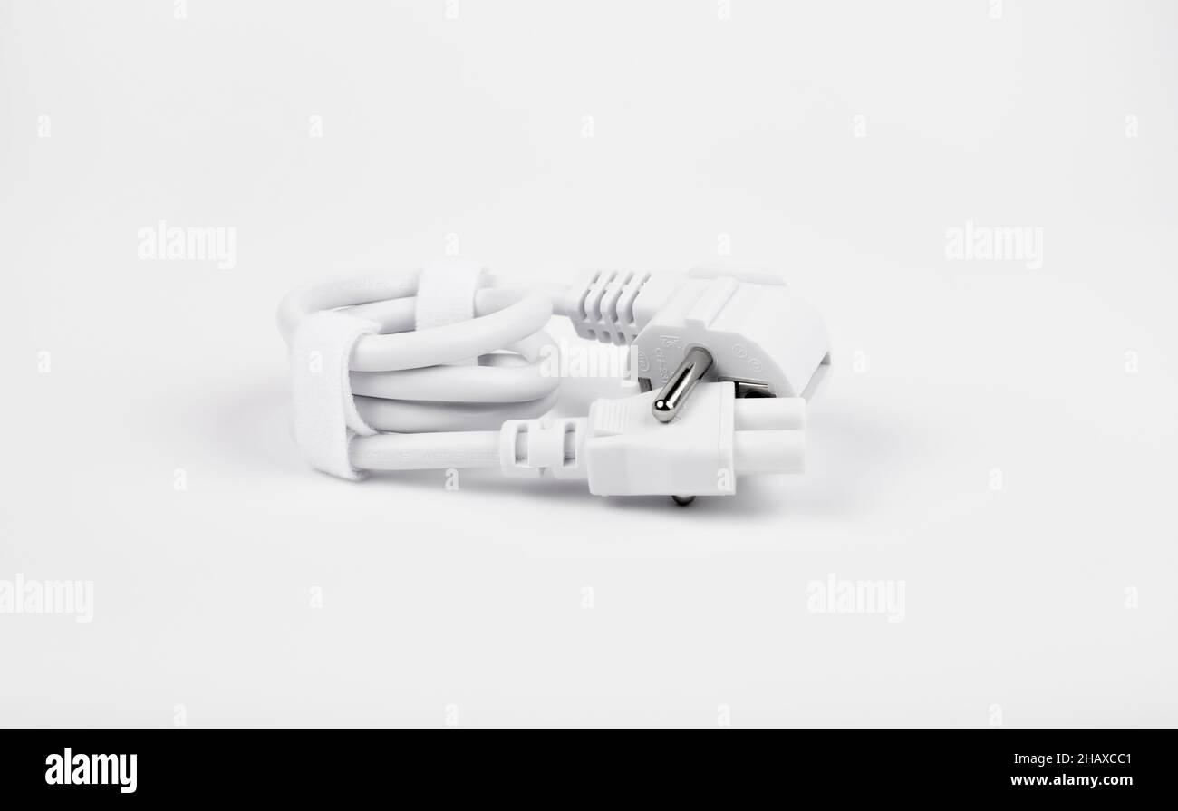 White cable for PoE injector for electronic equipment on a white ...