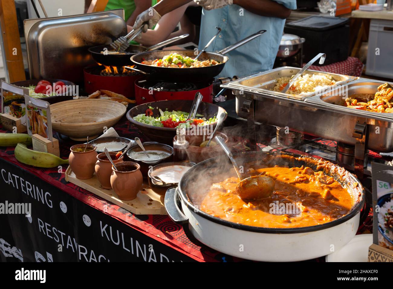 Cheff cooking fusion international cusine on street stall on ...