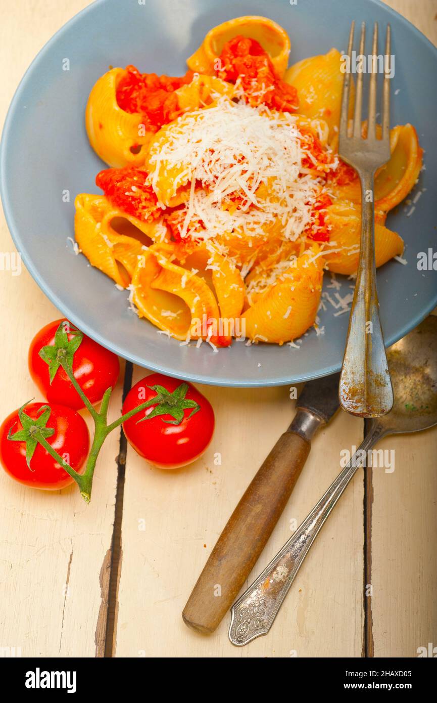 Italian snail lumaconi pasta with ripe cherry tomatoes sauce ...