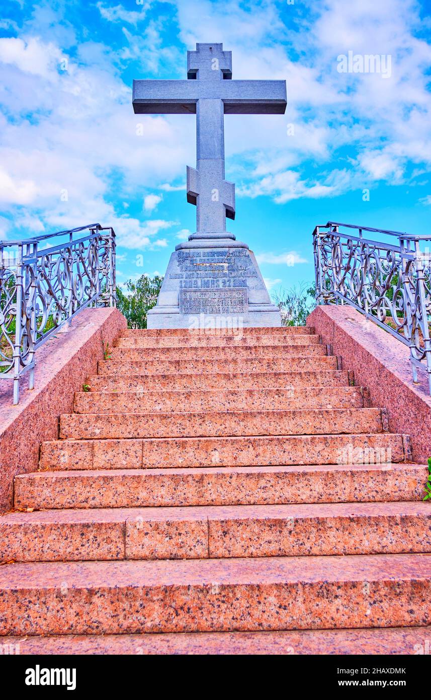 The staircase and the cross on the top of memorial mound of common ...