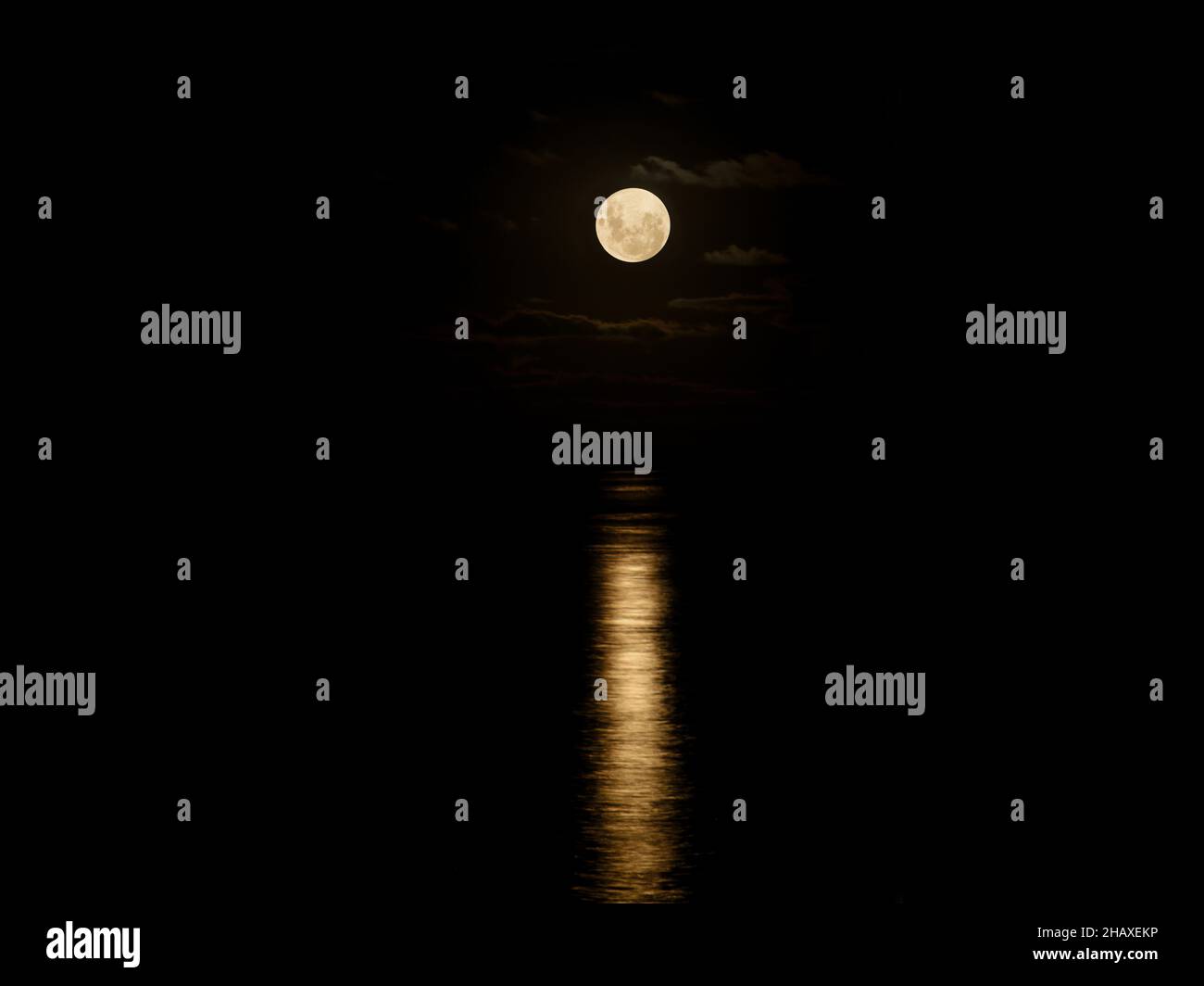 Scenic view of the full moon reflecting on the water Stock Photo - Alamy