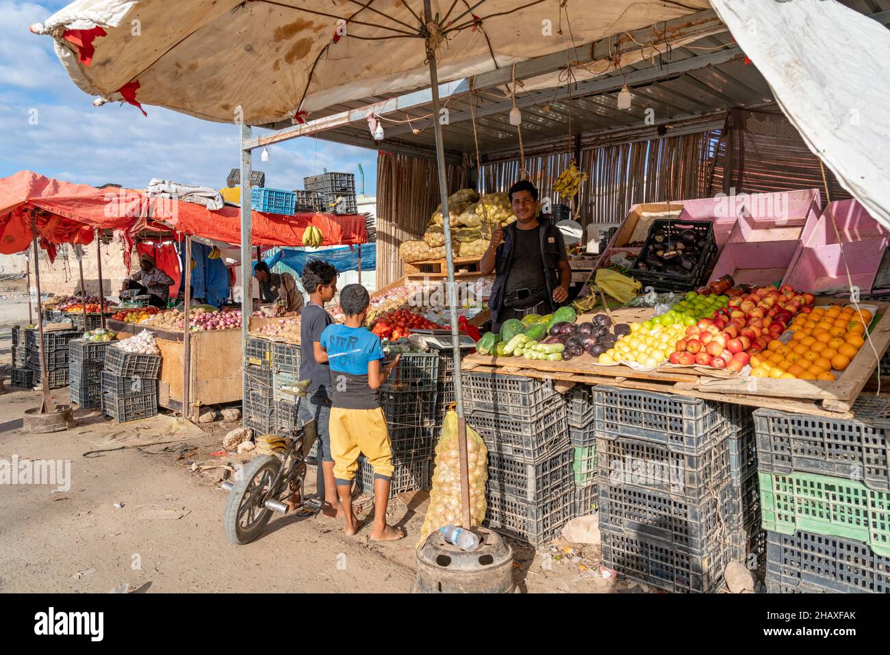 Market of fresh fruits on the street of the capital city Hadiboh ...