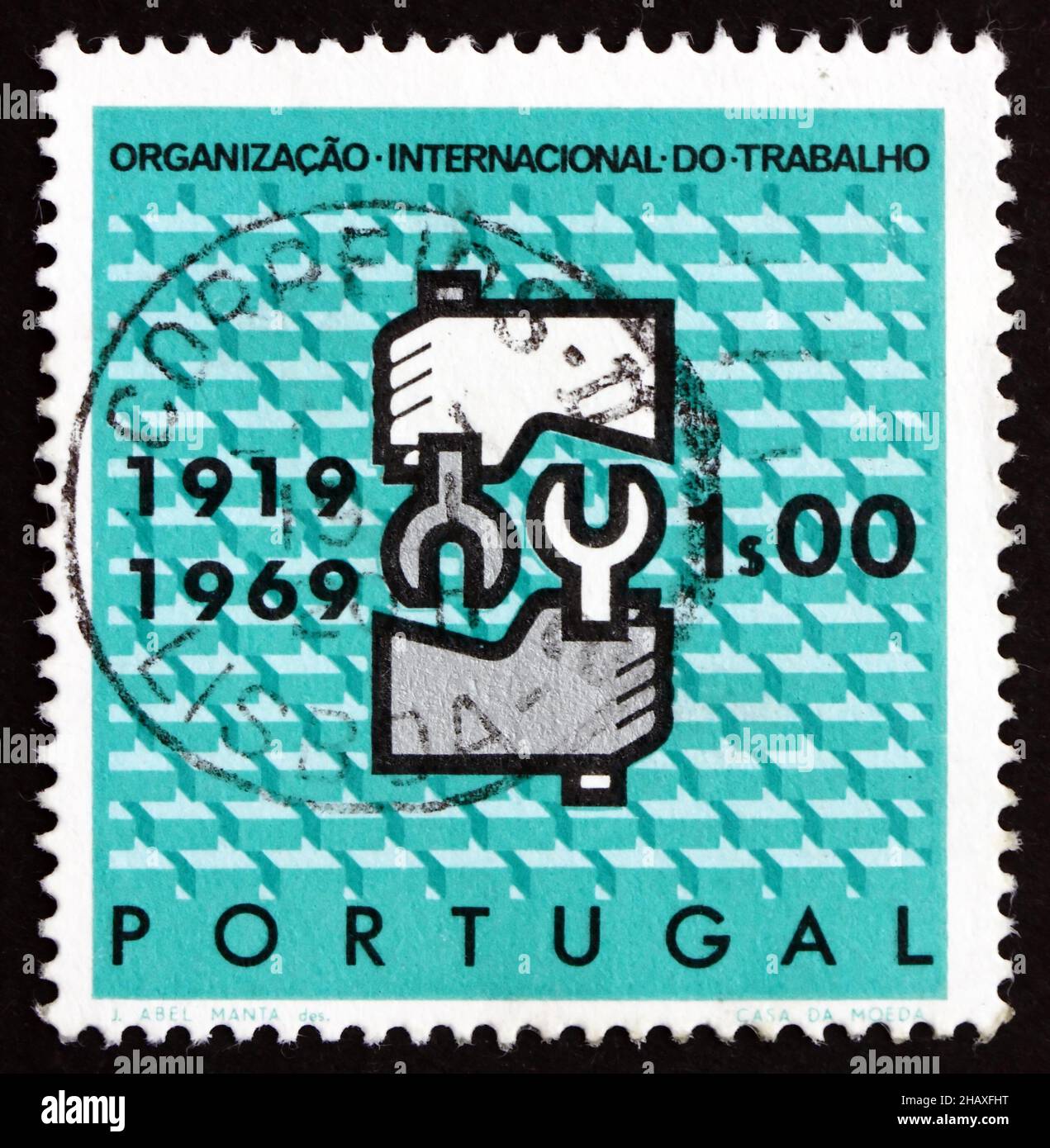 PORTUGAL - CIRCA 1969: a stamp printed in the Portugal shows ILO Emblem ...