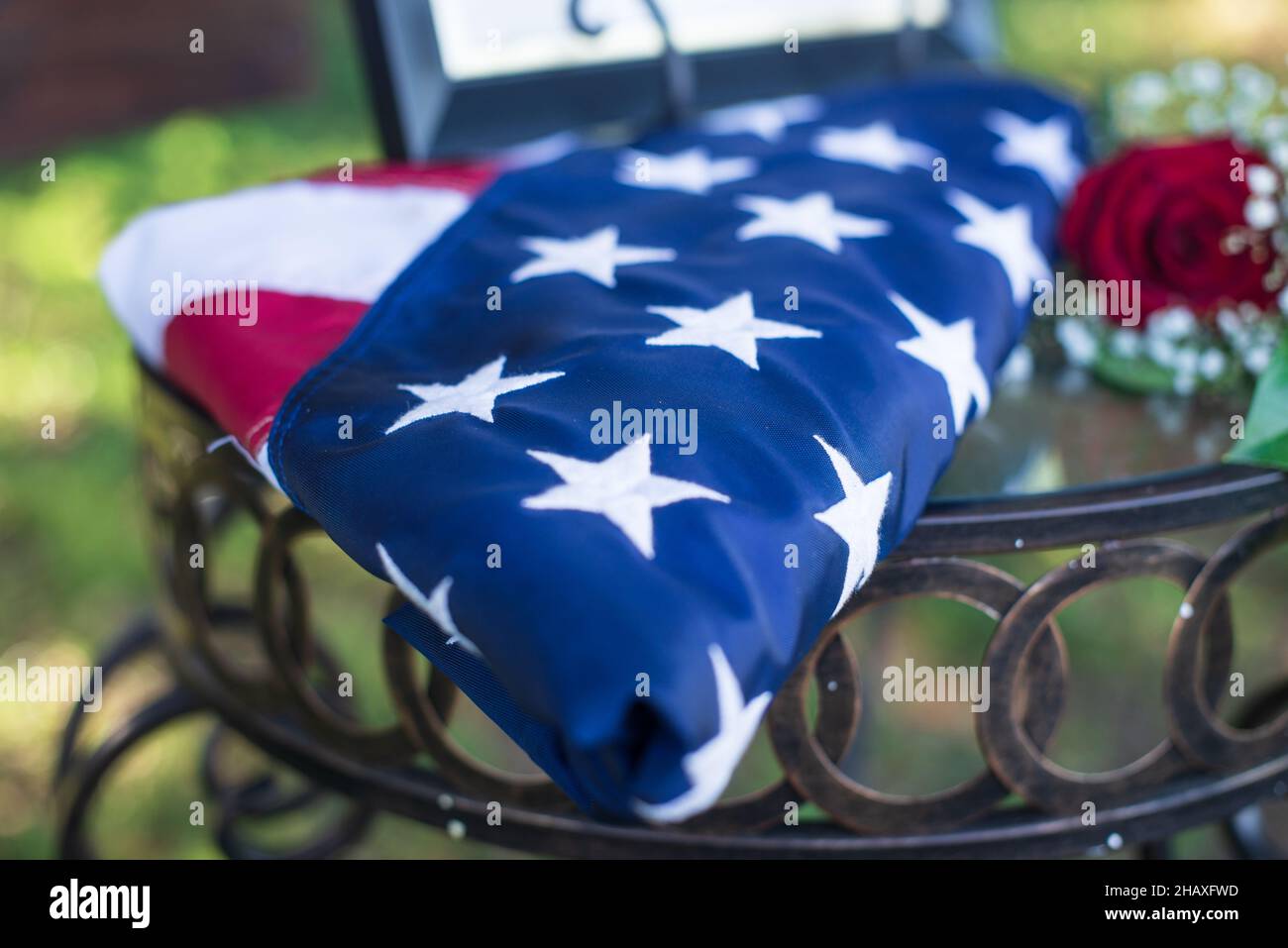 Veterans memorial American flag folded military style Stock Photo - Alamy