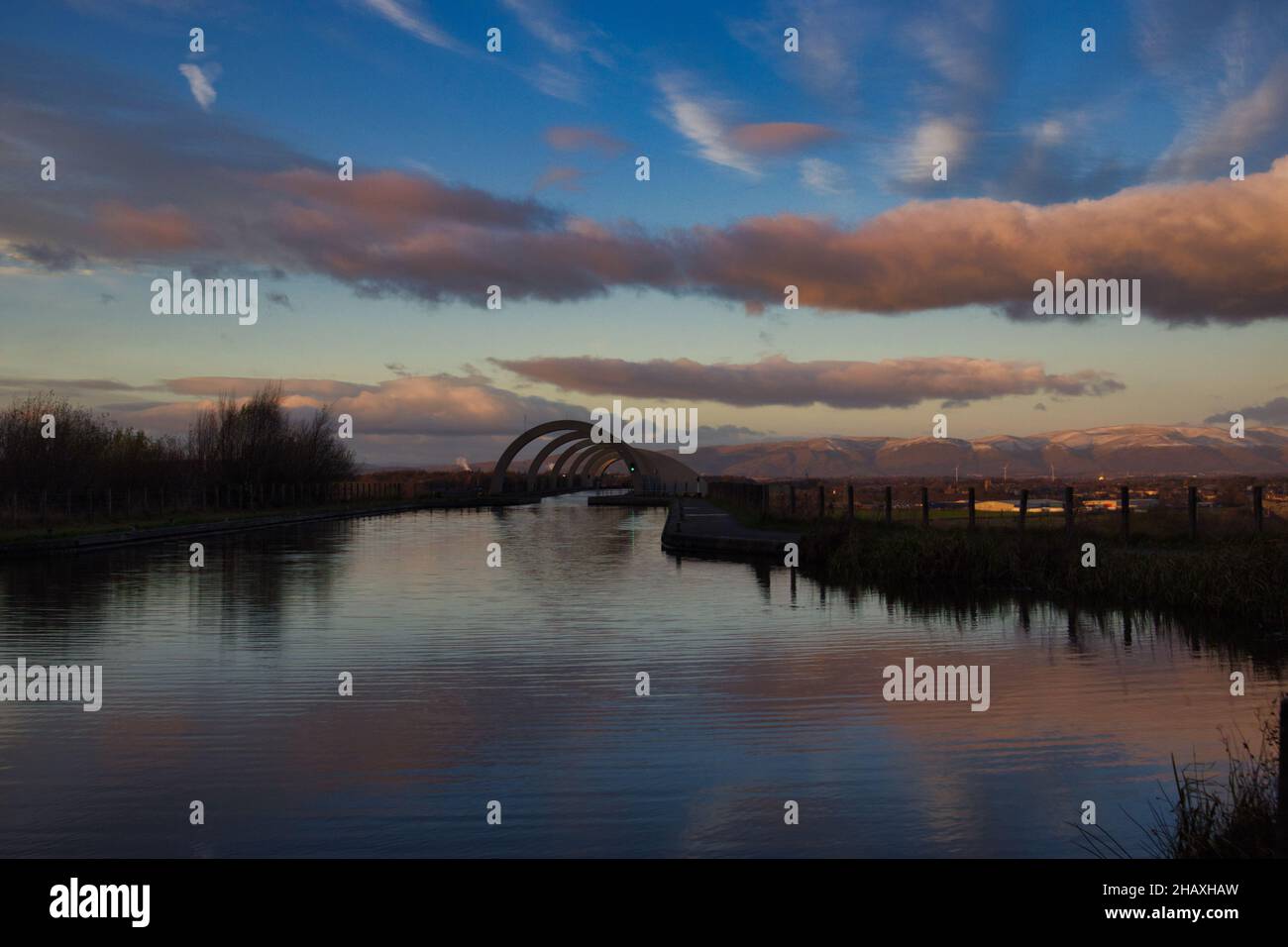 At the top of the Falkirk wheel on the canal, the wheel connects the ...