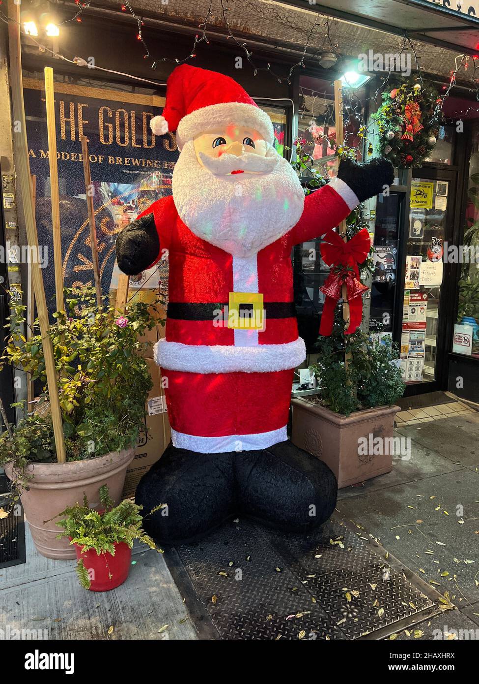 Santa Claus in front of a local bodega along Church Avenue in the ...