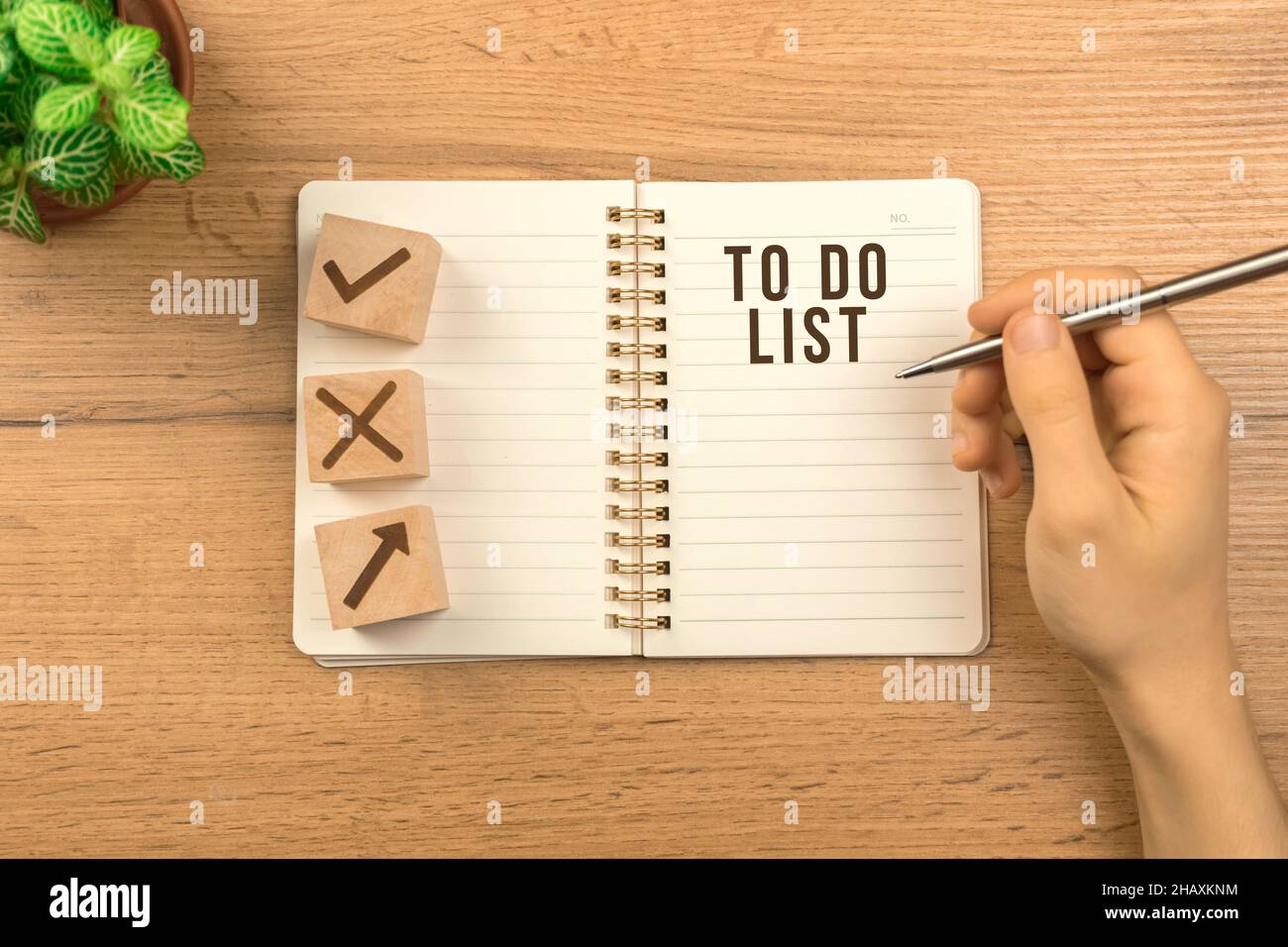 To do list concept. Wooden table background with empty notebook ...