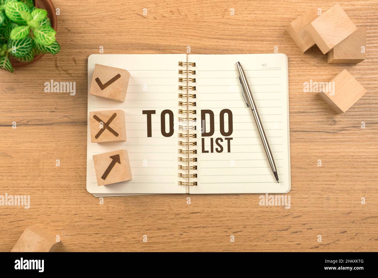 To do list concept. Wooden table background with empty notebook ...