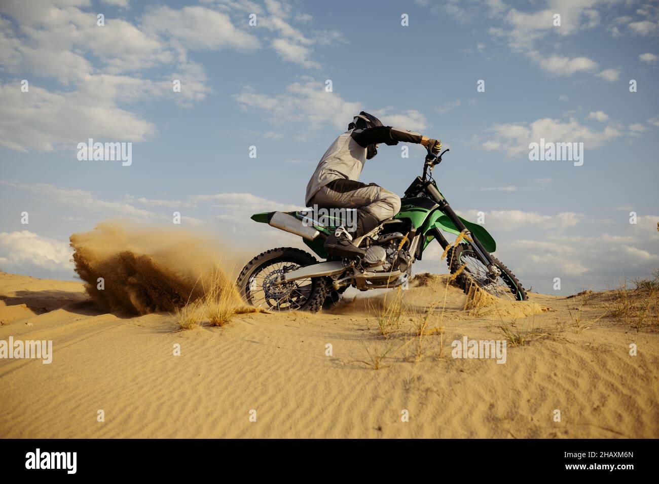 Professional speed rider driving in motocross race Stock Photo - Alamy