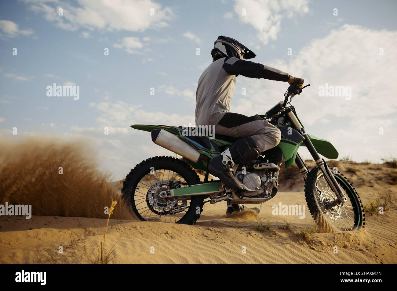 Professional speed rider driving in motocross race Stock Photo - Alamy