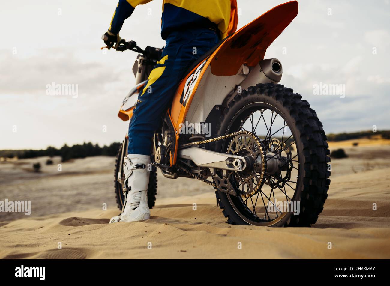 Professional speed rider driving in motocross race Stock Photo - Alamy