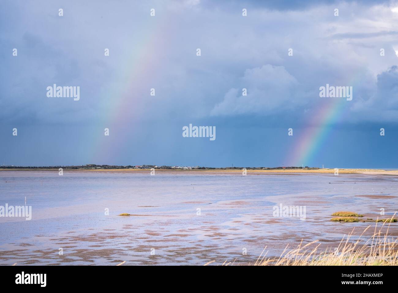 Double rainbow over sand dunes Stock Photo - Alamy