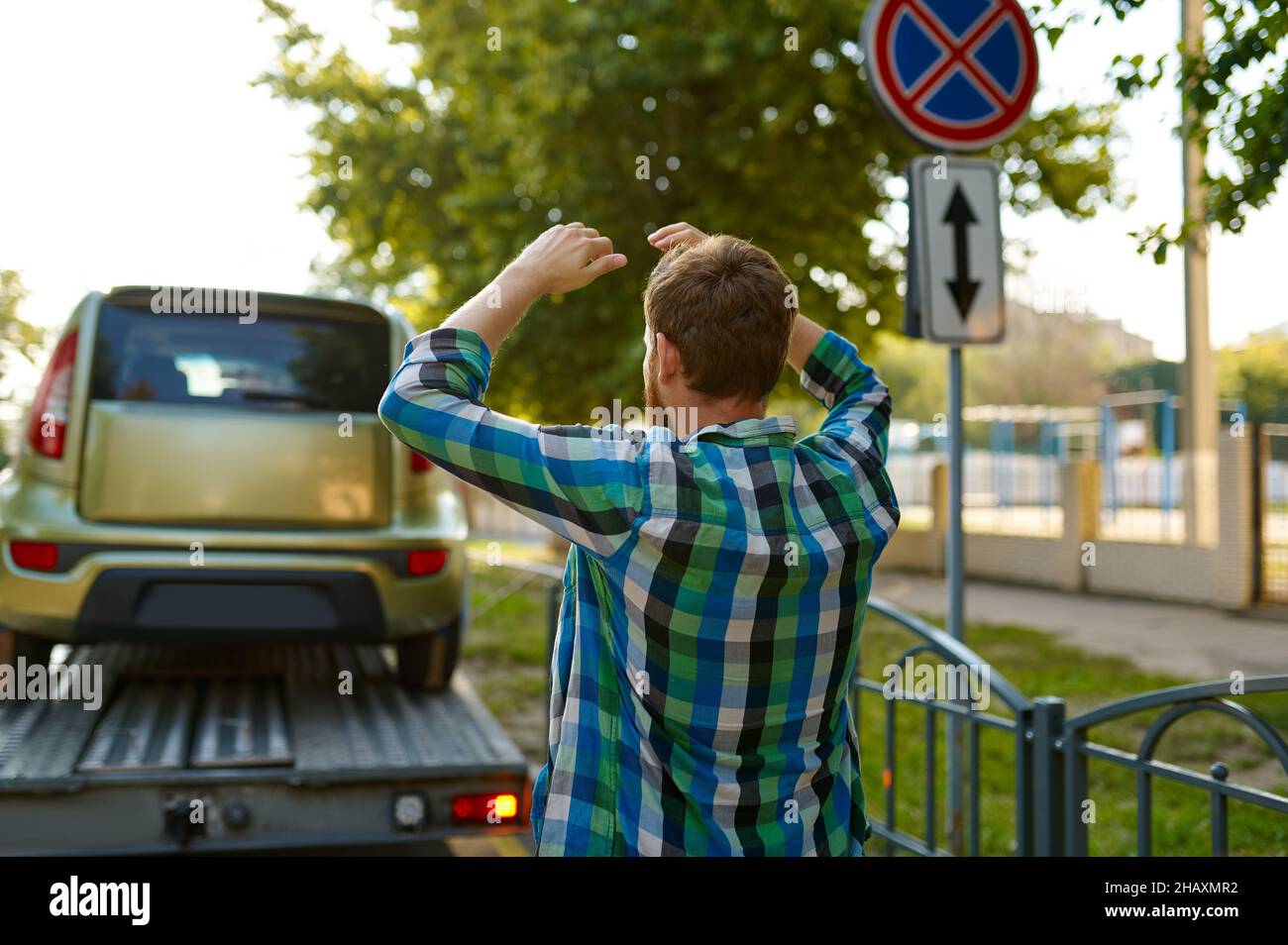 Worried driver having improper parking rule violation Stock Photo - Alamy