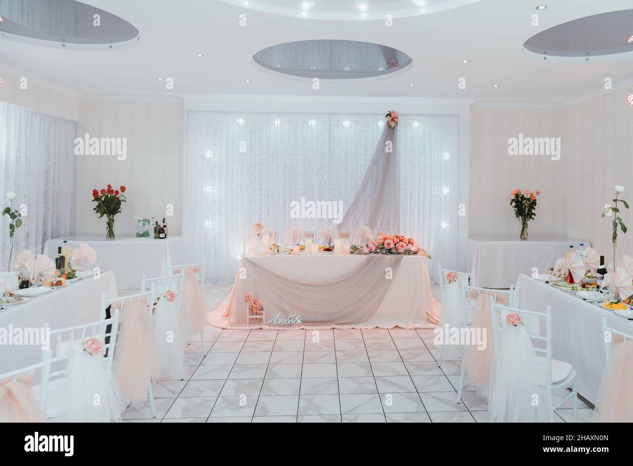 Beautiful flowers on wedding table. Table set for an event party or ...