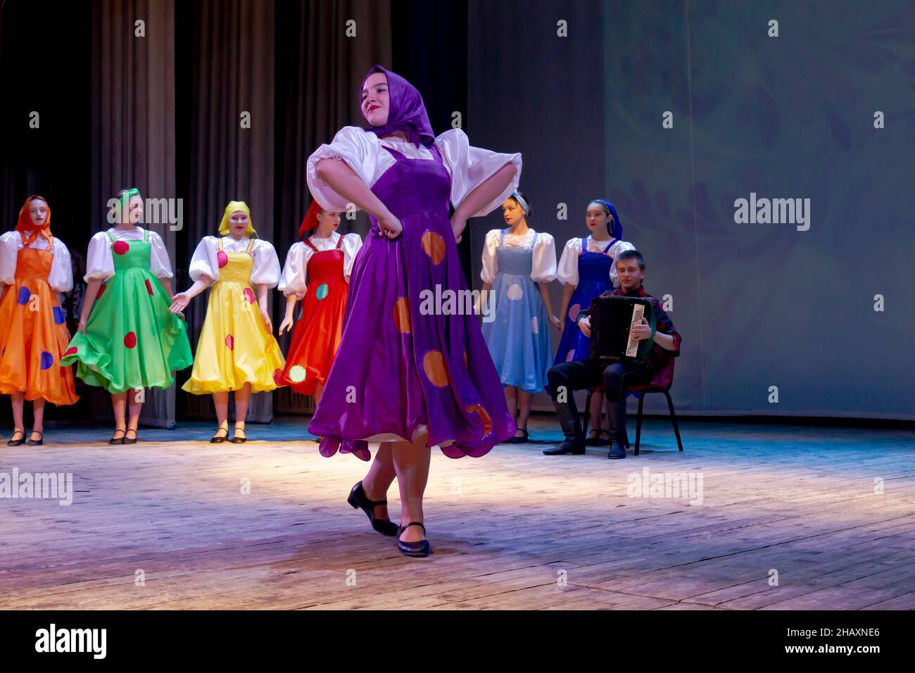 Omsk, Russia. 05 December, 2021. A girl-dancer, against the background ...