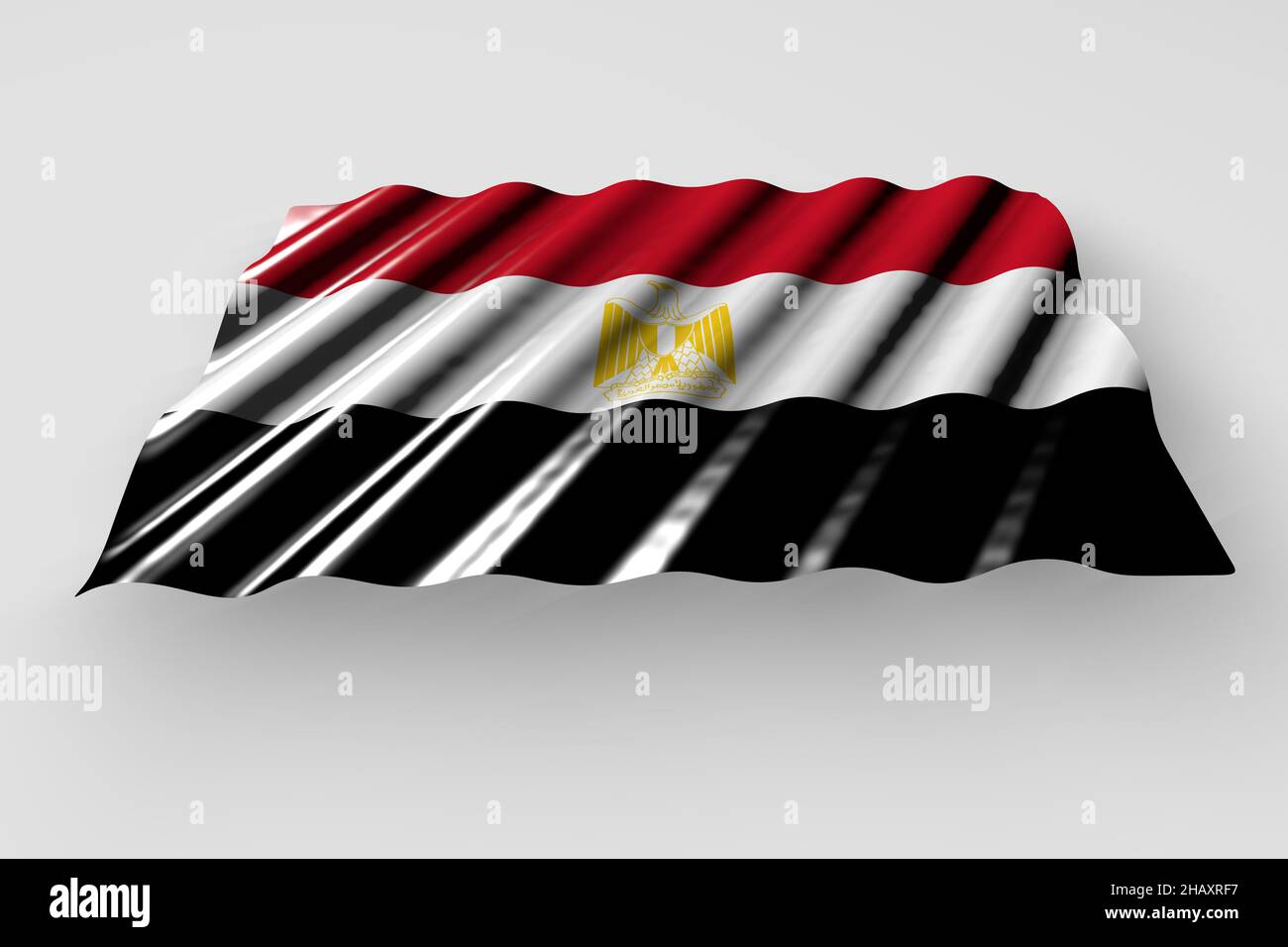 beautiful shiny flag of Egypt with big folds lay isolated on grey - any ...