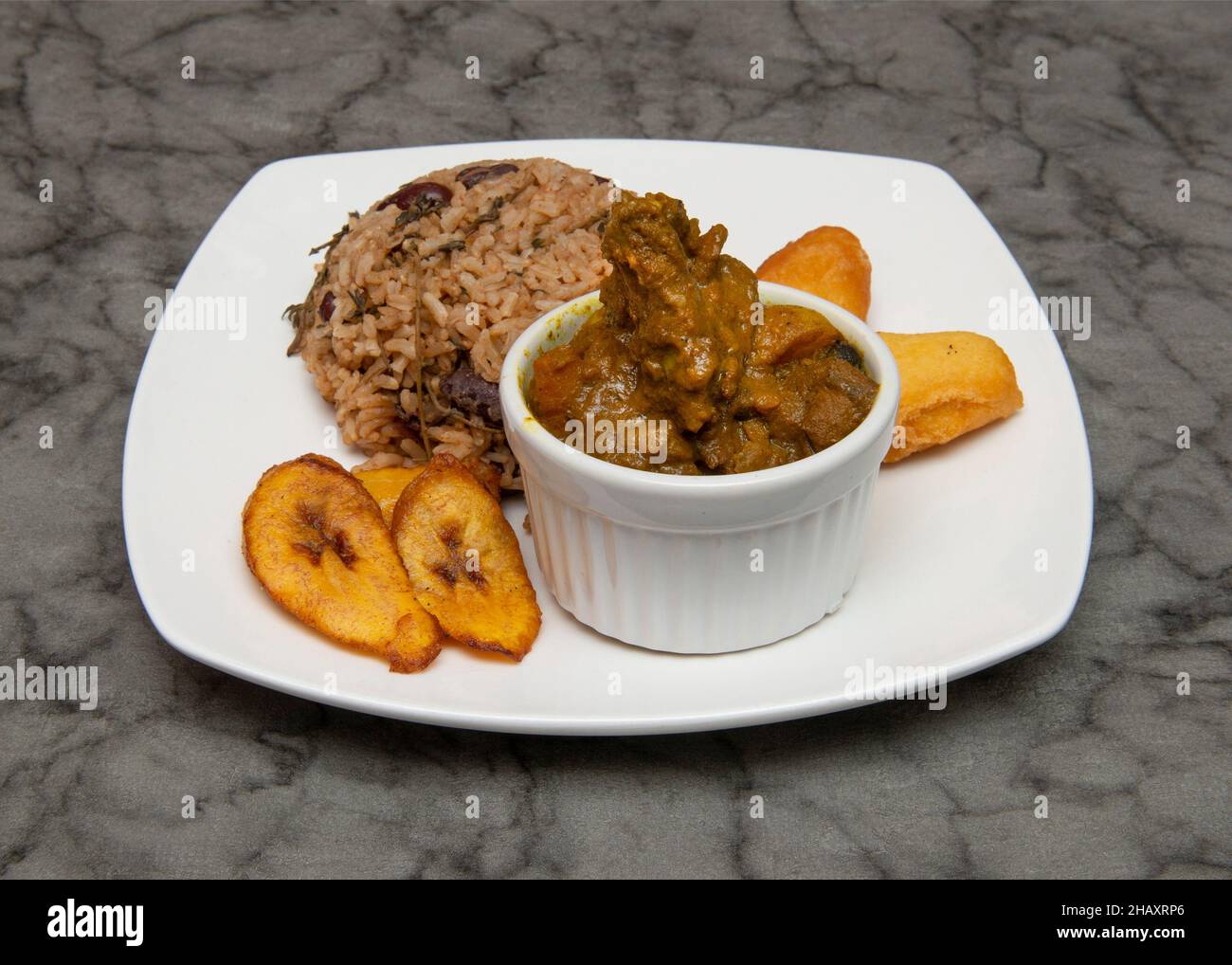 Jamaican curried chicken rice and peas hi-res stock photography and ...