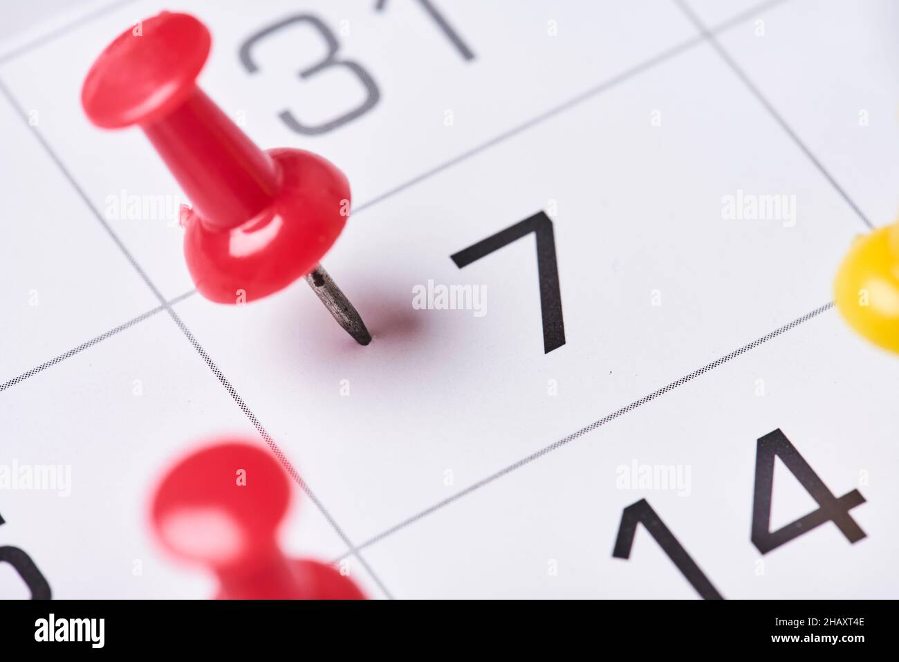 Colored push pins on monthly calendar page. Calendar appointments ...