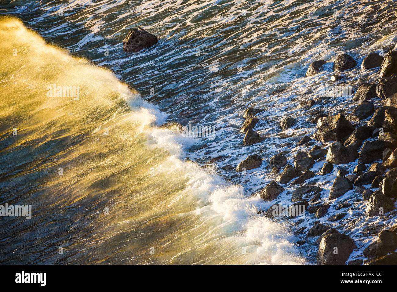 Golden sea waves in morning sunrise in Madeira island, Portugal Stock ...
