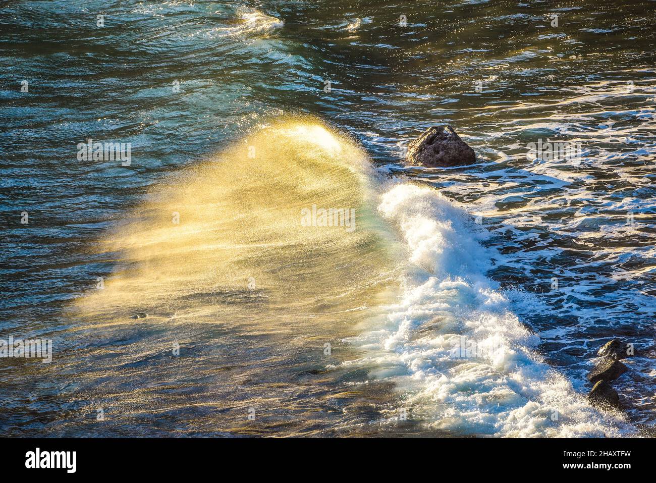 Golden sea waves in morning sunrise in Madeira island, Portugal Stock ...