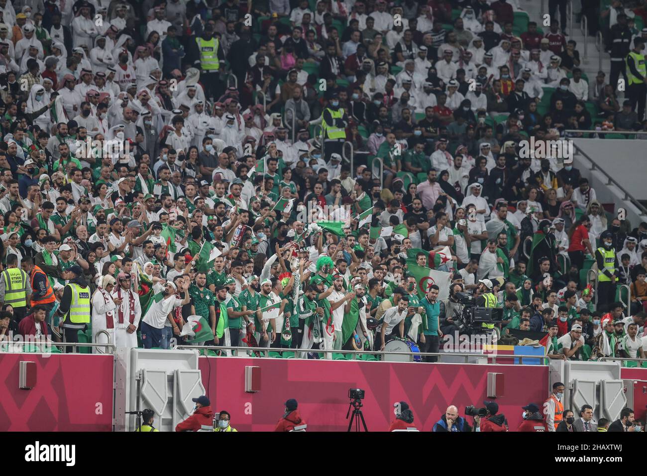 Doha, Qatar. 15th Dec, 2021. Algeria fans cheer in the stands during ...