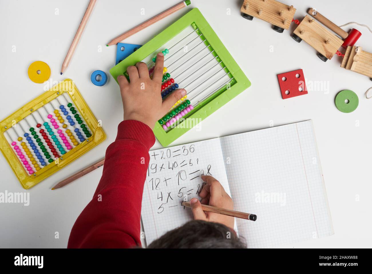 Mental math for adults. Doing math. Cropped shot of a person hands ...