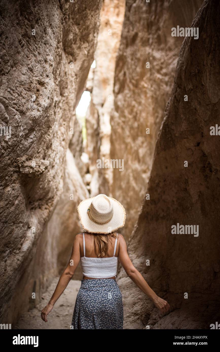 Side view crop focused male in casual clothes filling survey form while ...