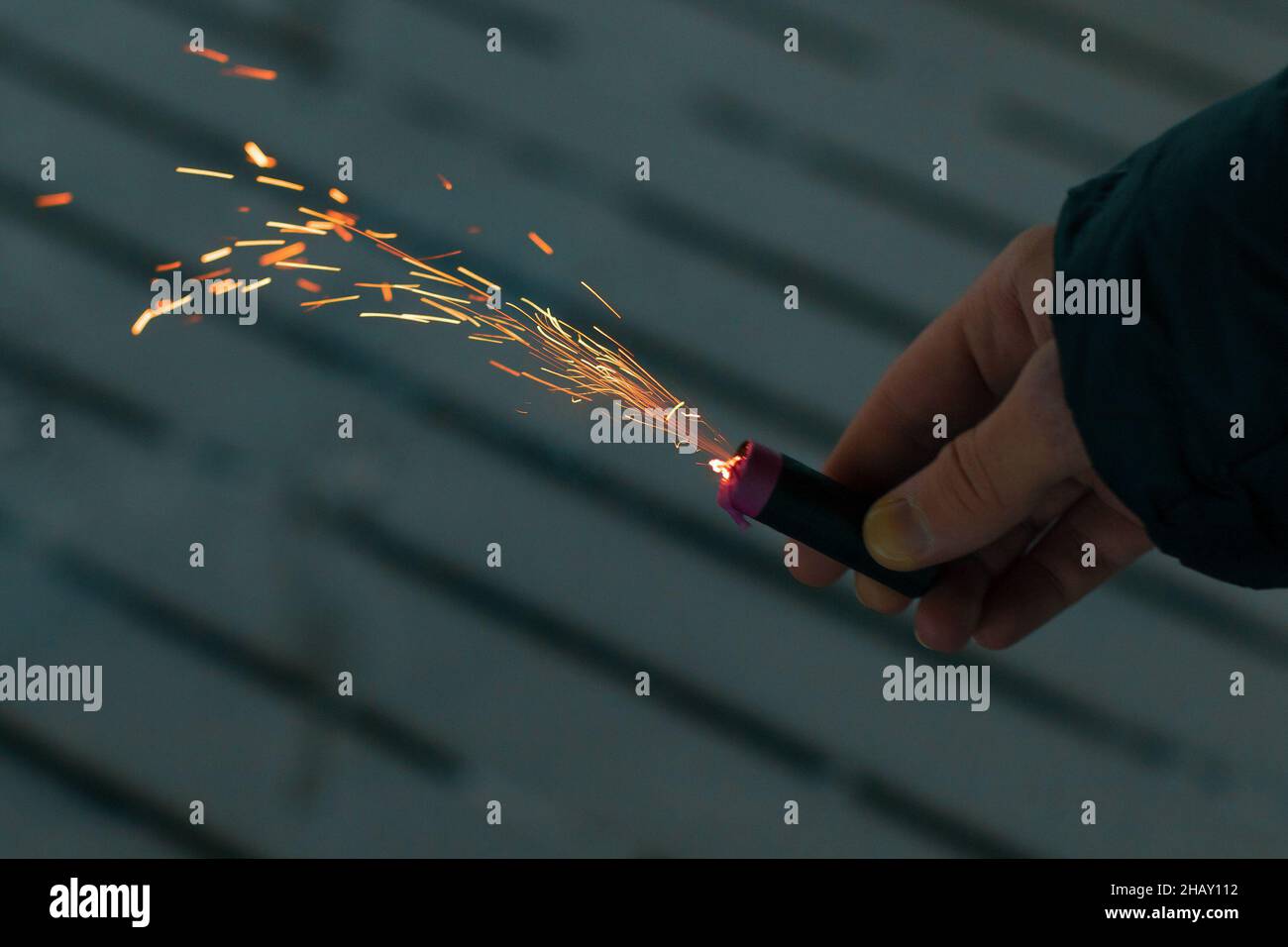 Burning Firecracker with Sparks. Guy Holding a Petard in a Hand. Loud ...