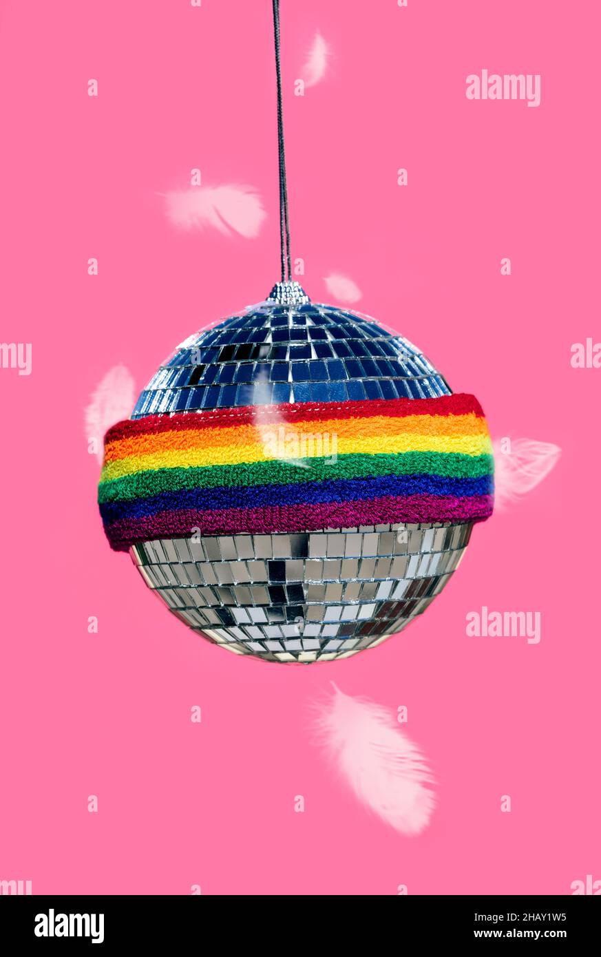 Scrunchy bright rainbow LGBT colors on small shining silver disco ball ...